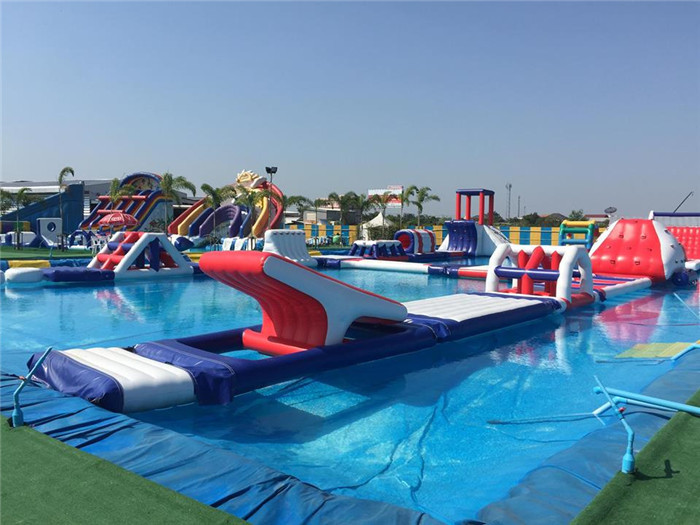 Anti - UV 0.9mm PVC Tarpaulin Inflatable Water Obstacle Course For Lake